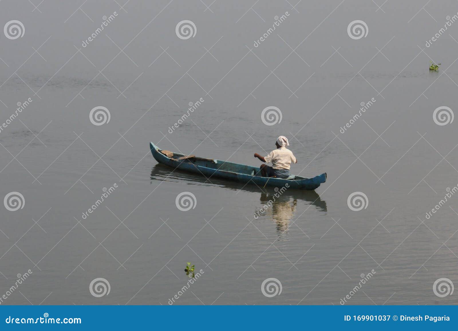 Boatman in the river stock image. Image of green, river - 169901037