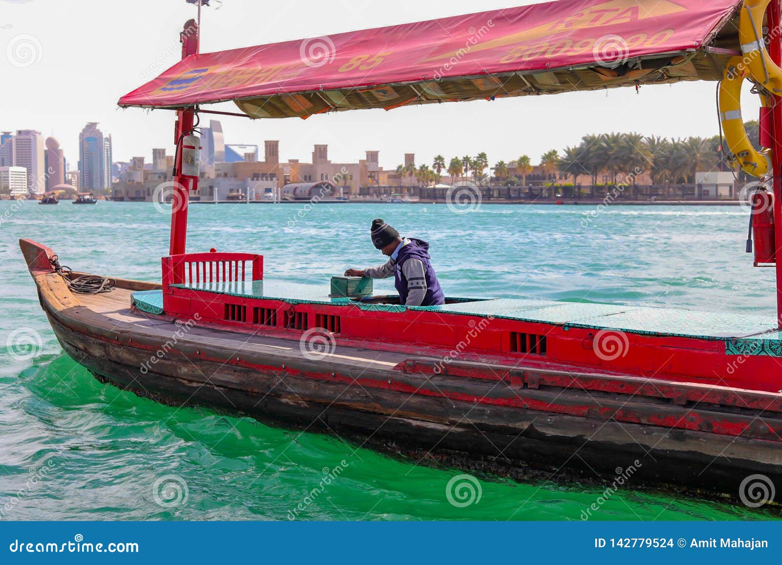 Boatman in a sea editorial stock image. Image of cruise - 142779524