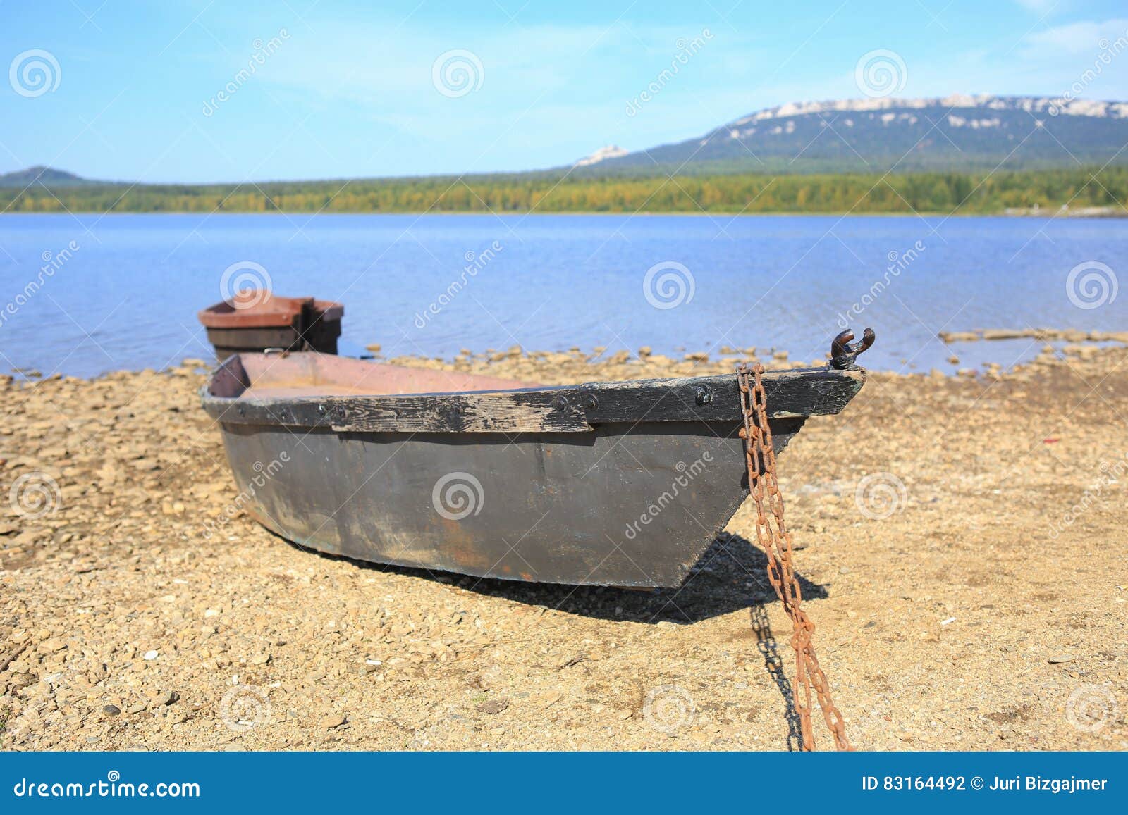 Boats on bank of lake stock photo. Image of nonurban - 83164492
