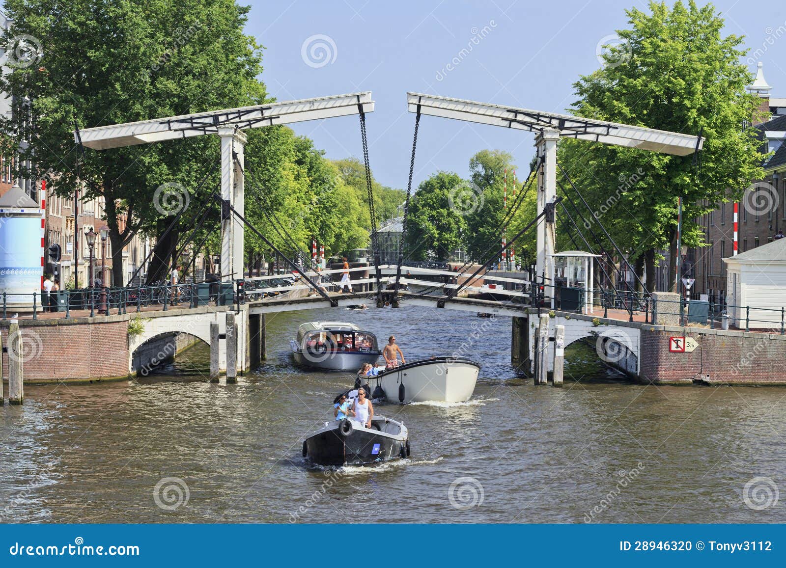 Boats in a Canal with Drawbridge in Amsterdam. Editorial Image - Image ...