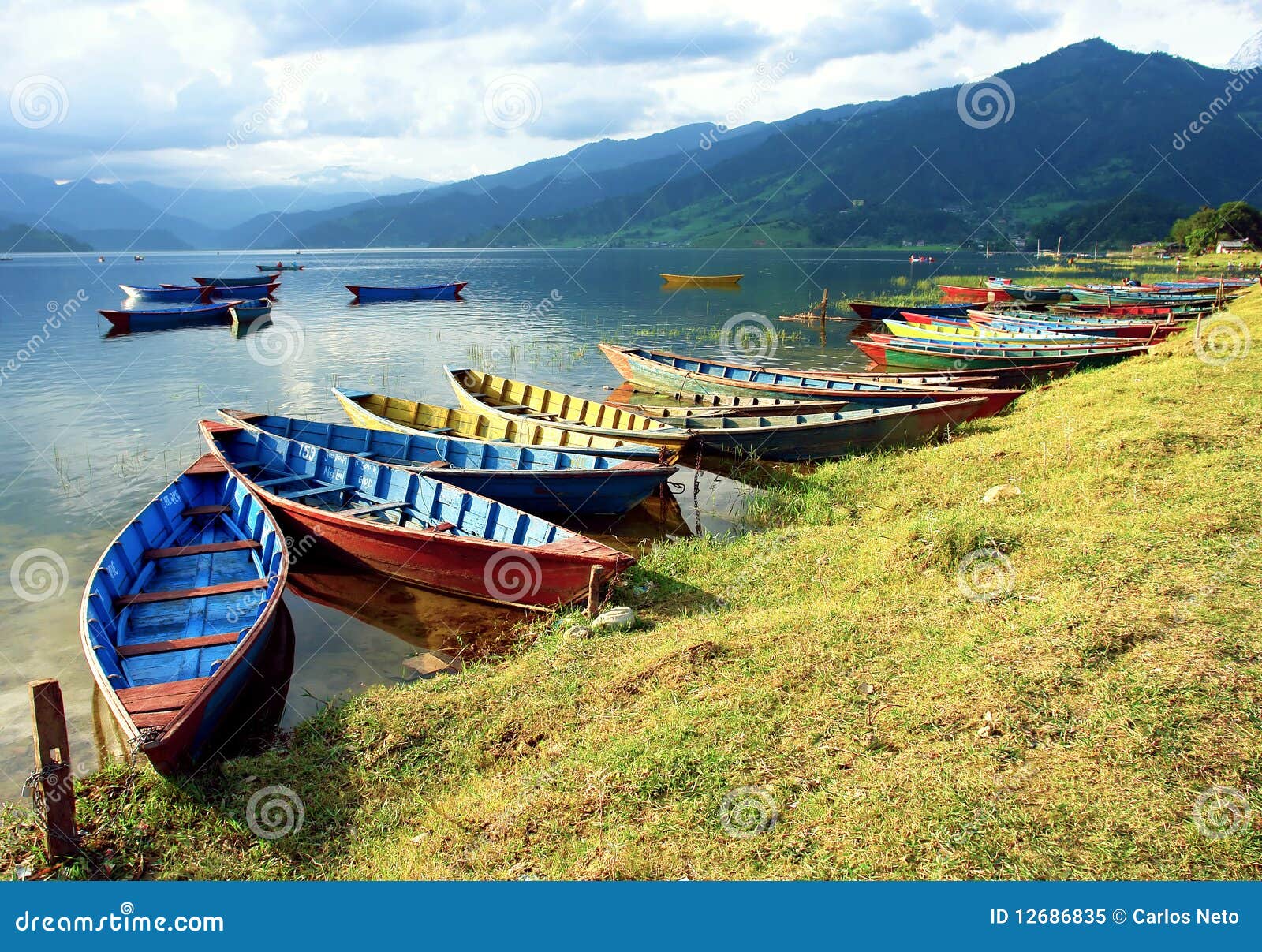 Boats in Fewa Lake stock image. Image of lakeside, hill - 12686835