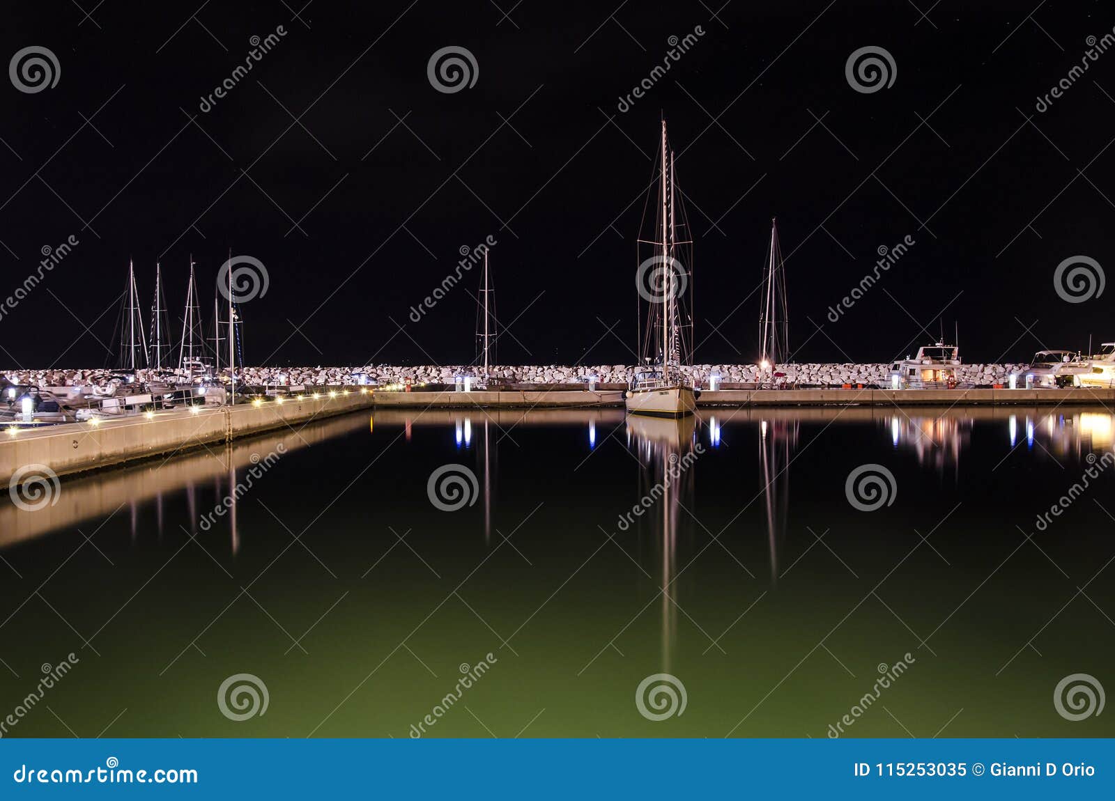 Boats and Lights at the Port Reflected in Water at Night Editorial ...