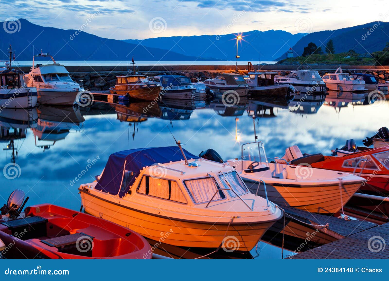 Boats on a moorage stock photo. Image of reflection, wharf - 24384148