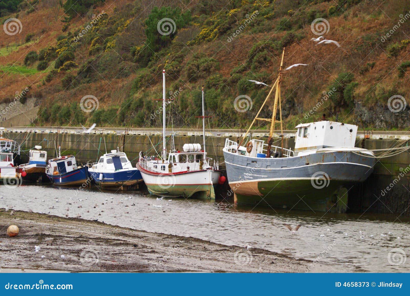 Boats moored at low tide stock image. Image of moored - 4658373