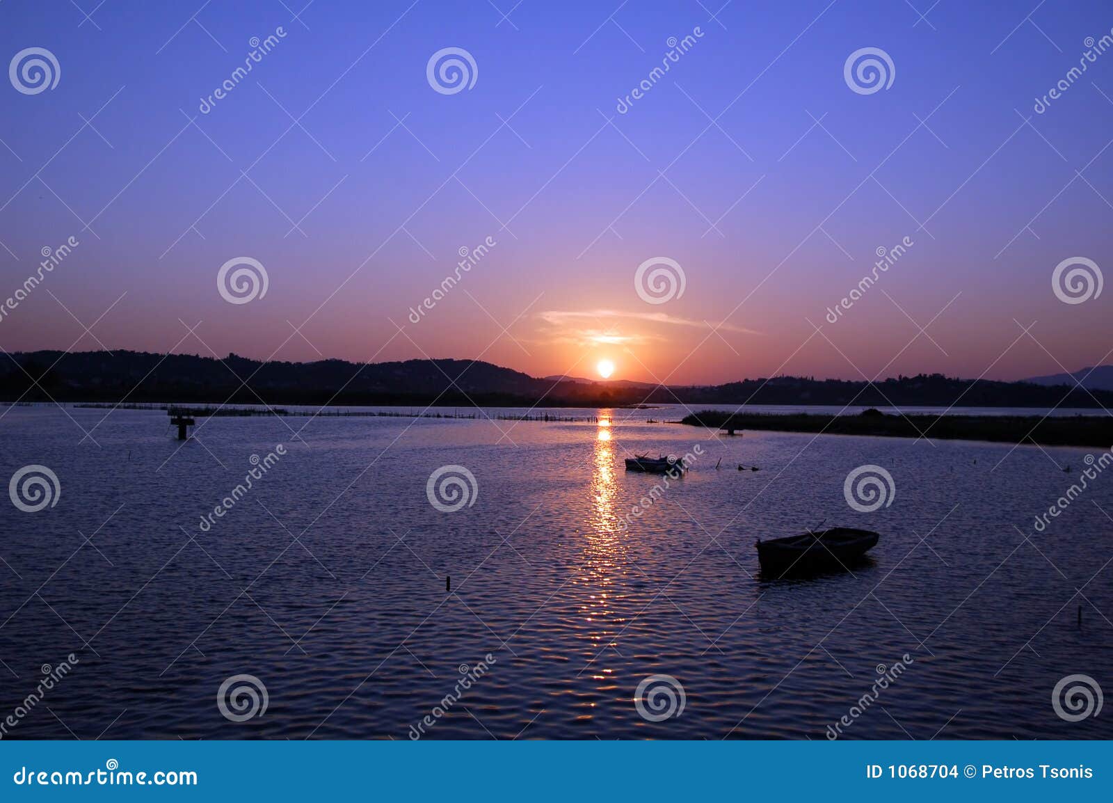 Boats Resting in the Warm Sunset Stock Photo - Image of dusk, beach ...