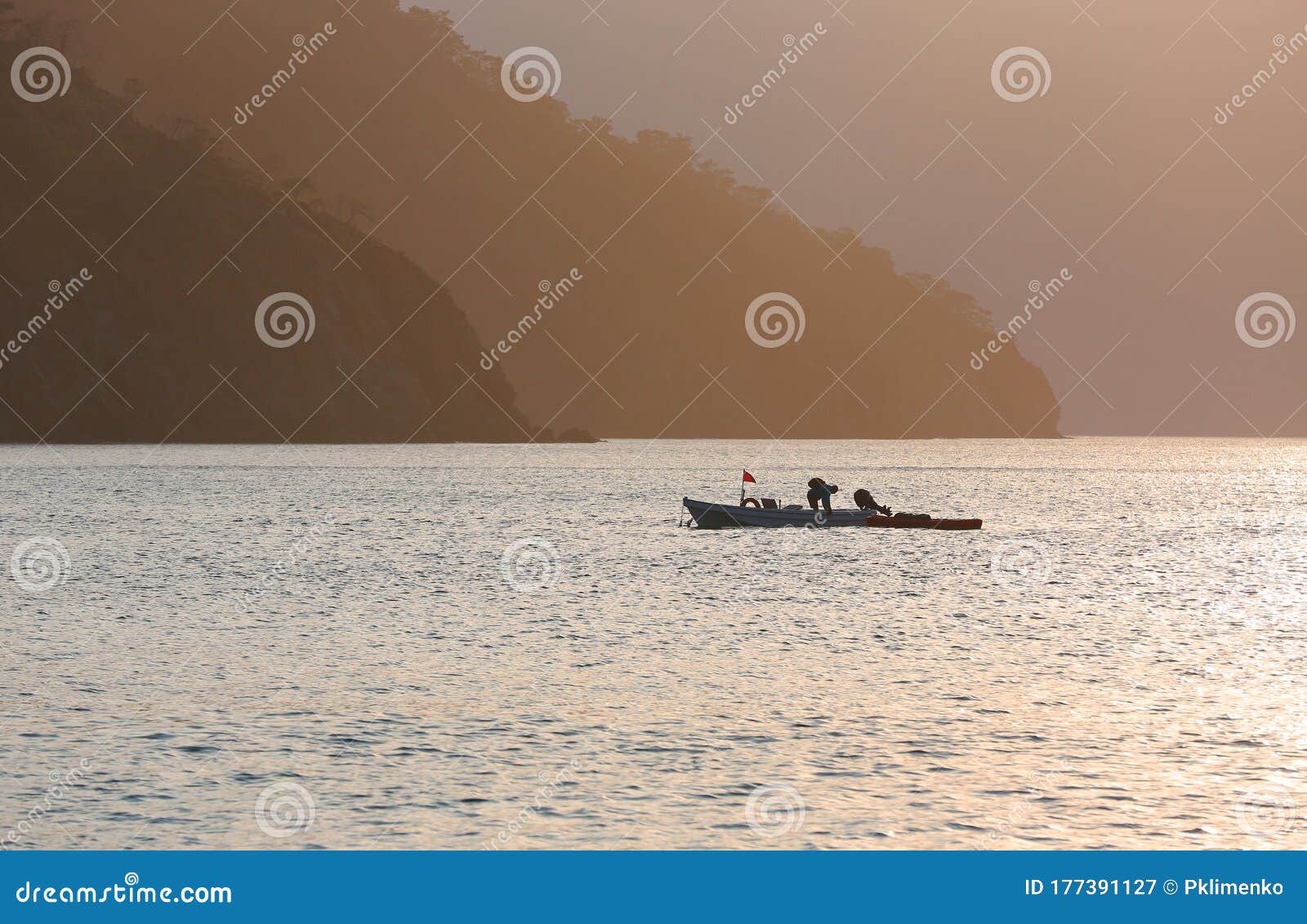 Boats on sea stock image. Image of coast, mountain, gold - 177391127
