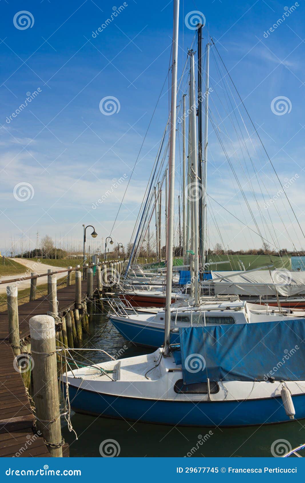 Boats in Small Port - Vertical Stock Image - Image of harbour, dock ...