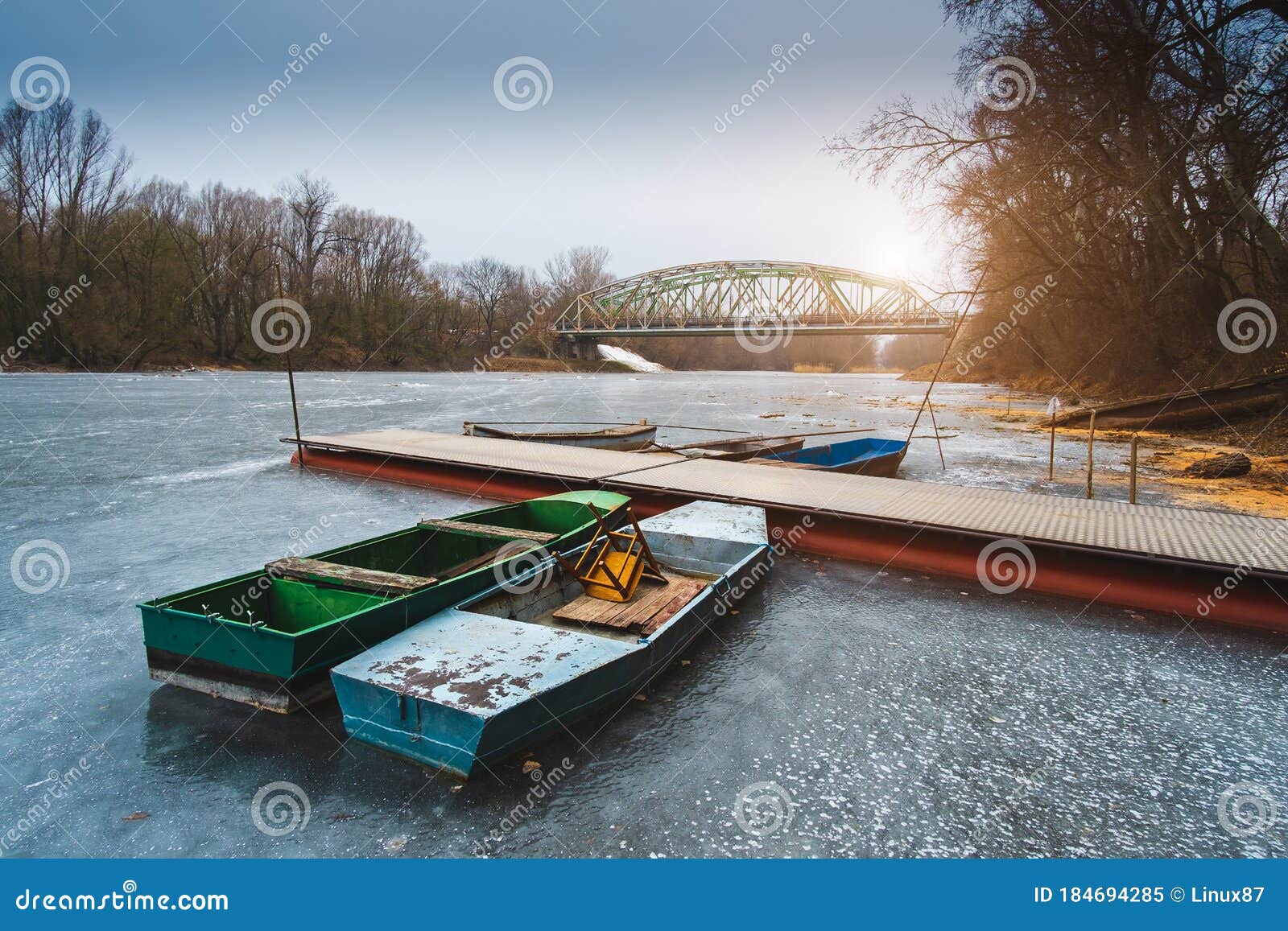 Boats on winter dock stock image. Image of sunset, peaceful - 184694285
