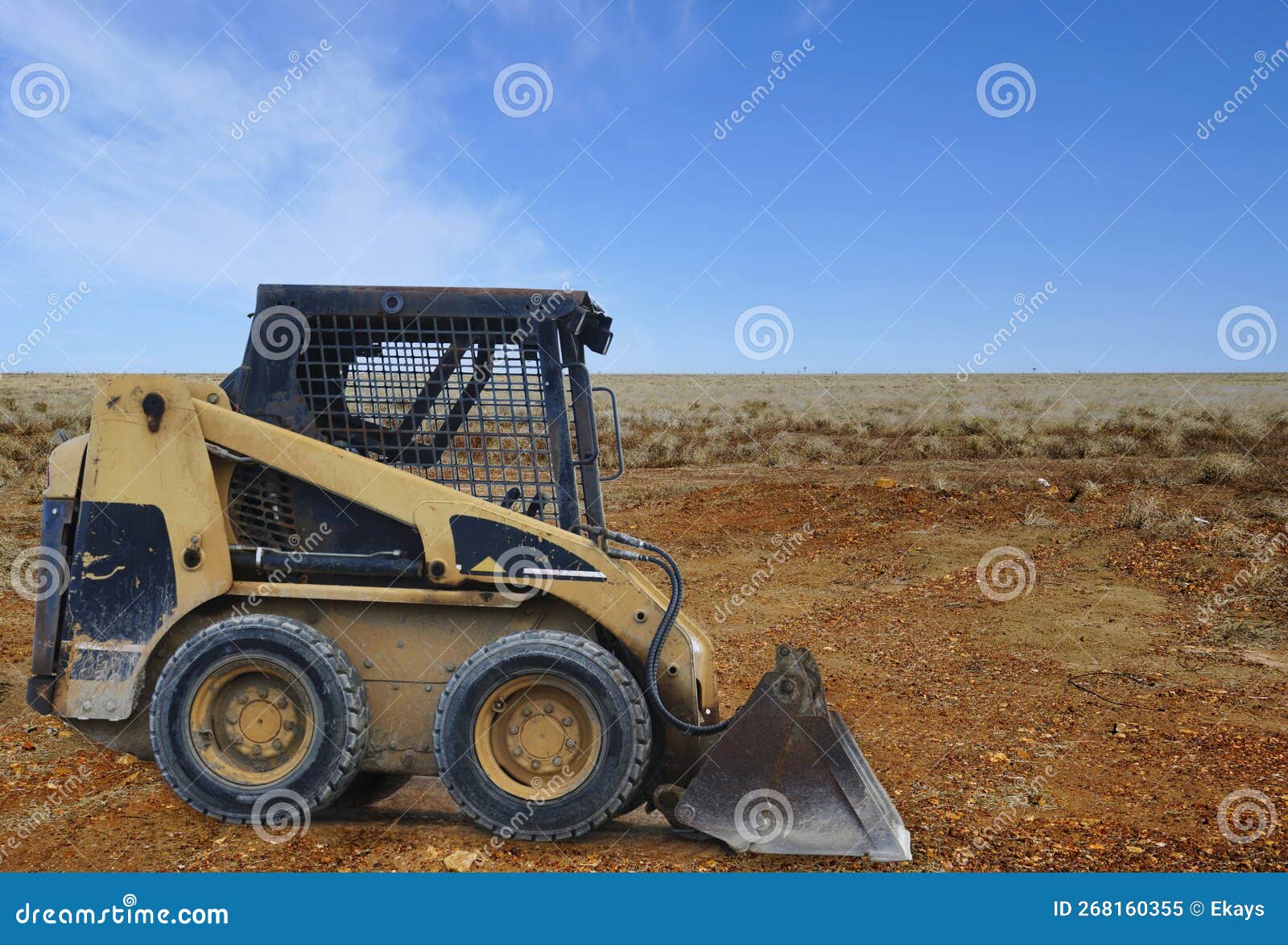 Bob Cat Machinery and Blue Sky Stock Image - Image of excavator ...