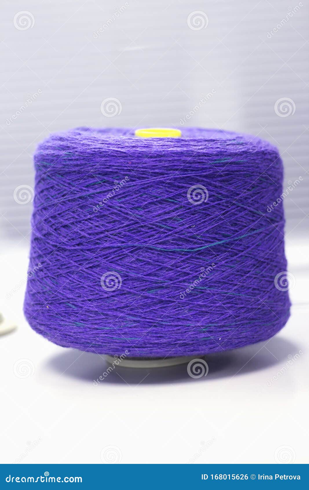 Bobbin with Purple Yarn on a Knitting Machine Stock Photo - Image of ...
