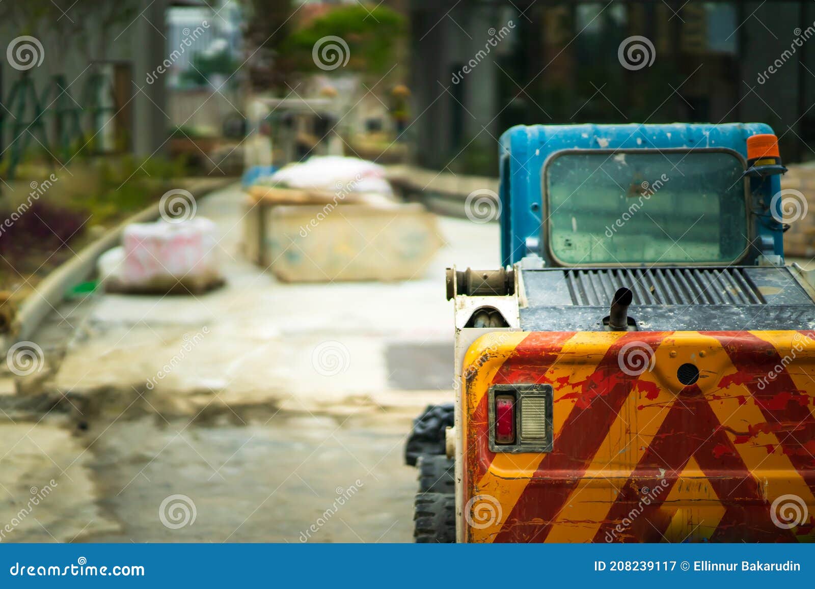 Bobcat or a Skid Loader in a Construction. View from Behind Stock Image ...
