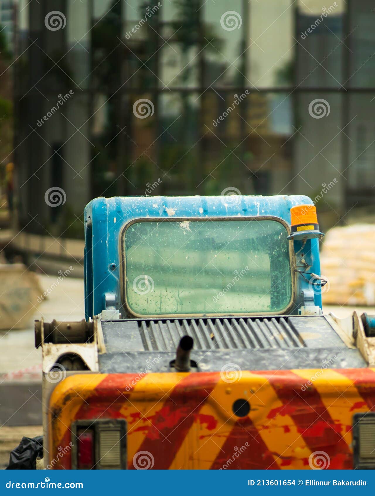 Bobcat or a Skid Loader in a Construction. View from Behind Stock Photo ...