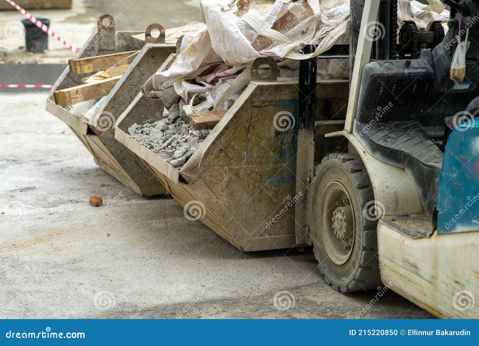 Bobcat or a Skid Loader in a Construction. View from Behind Stock Photo ...