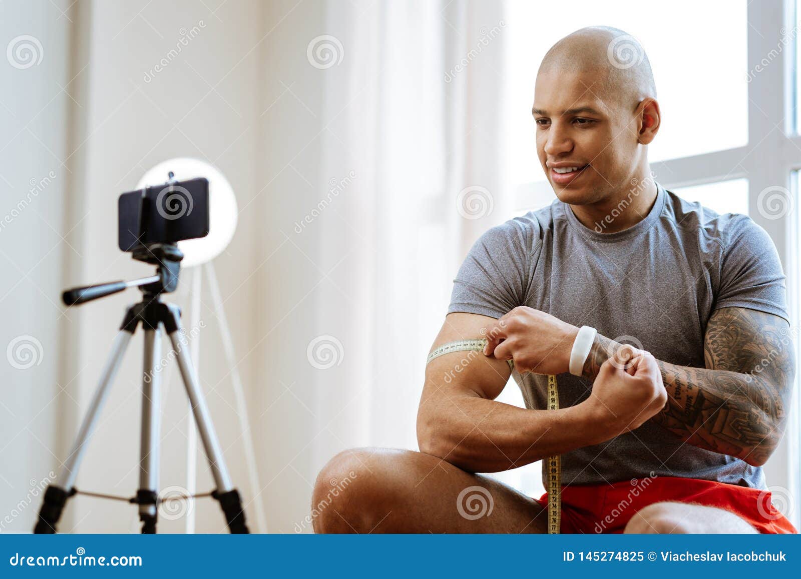 Bodybuilder Wearing White Smart Watch Measuring Biceps Stock Image ...