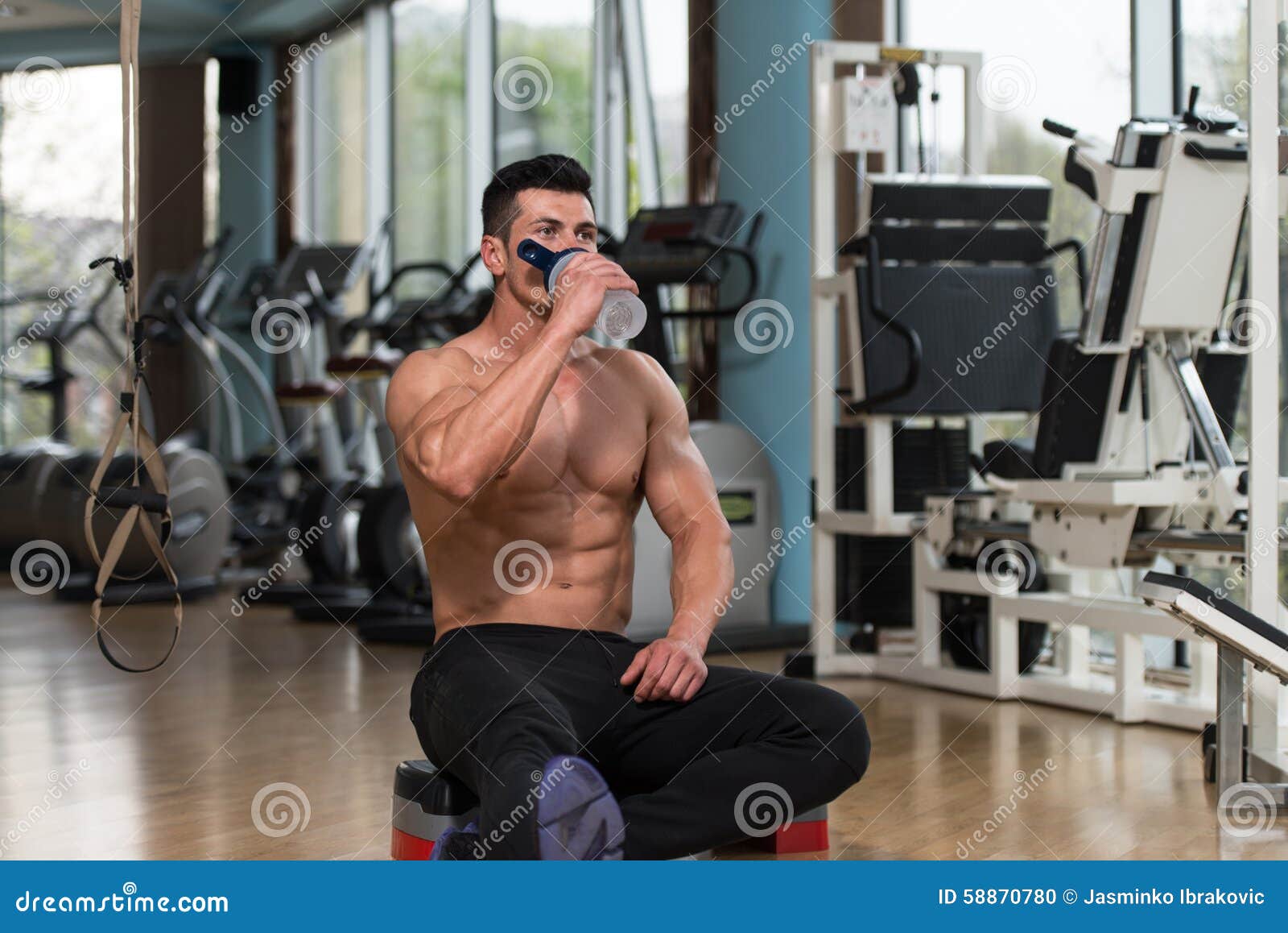 Body Builder Drinking Water from Shaker Stock Photo - Image of chest ...