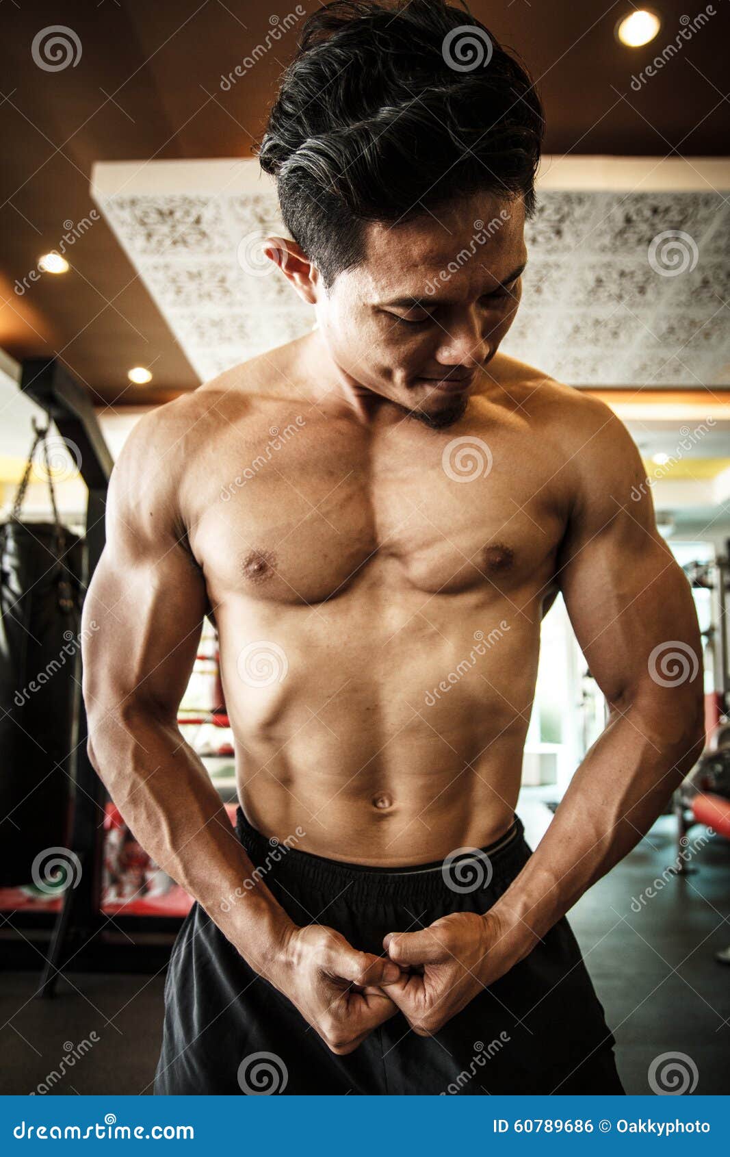 Body Builder Looking His Muscle Stock Photo - Image of adult, strength ...