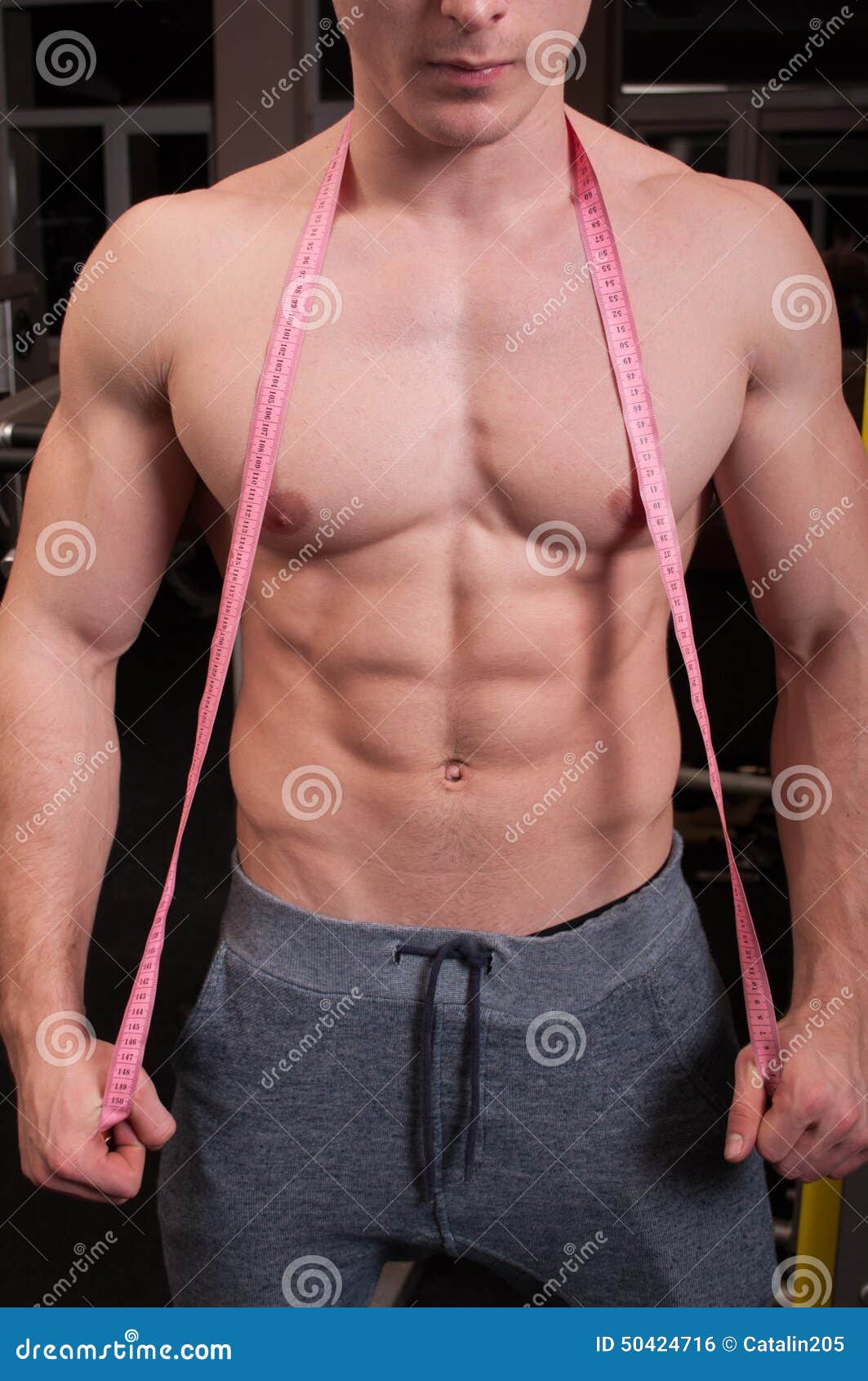 Body Builder Torso and Measuring Meter Stock Photo - Image of measurer ...