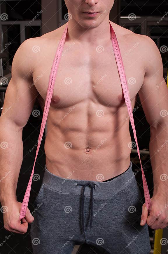 Body Builder Torso and Measuring Meter Stock Photo - Image of measurer ...
