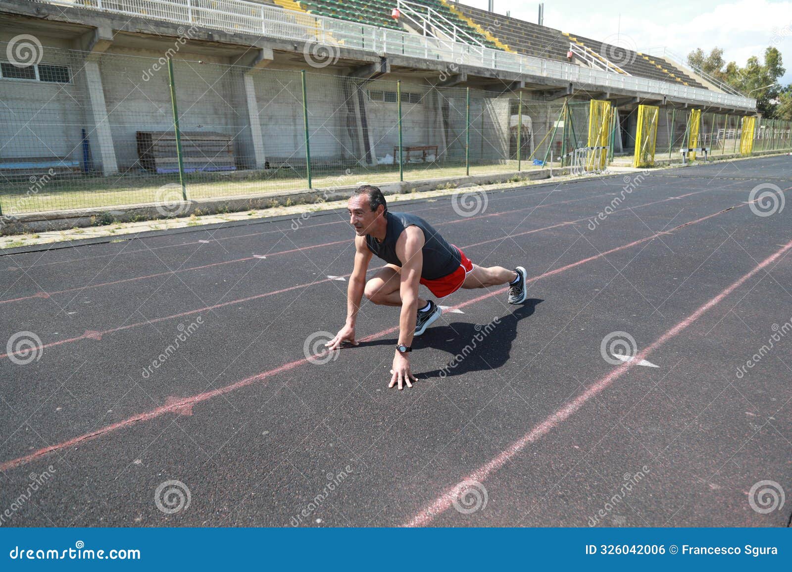 The Body of a Professional Runner Stretching Stock Photo - Image of ...