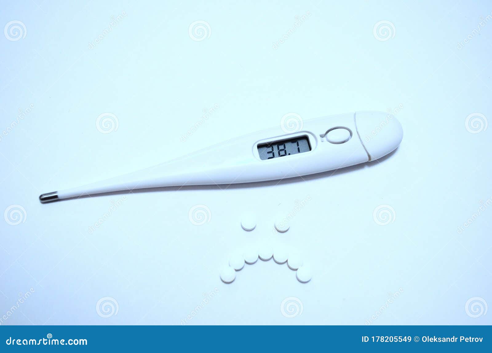 Body Thermometer with High Temperature and Pills in Shape of Sad Smile ...