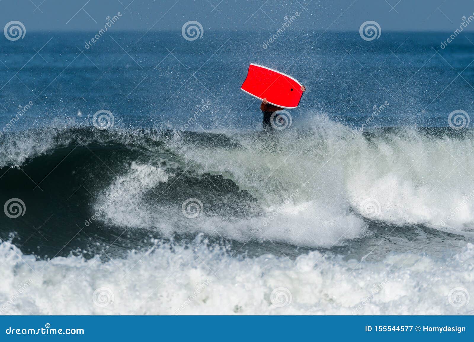 Bodyboarder in action stock image. Image of male, excitement - 155544577