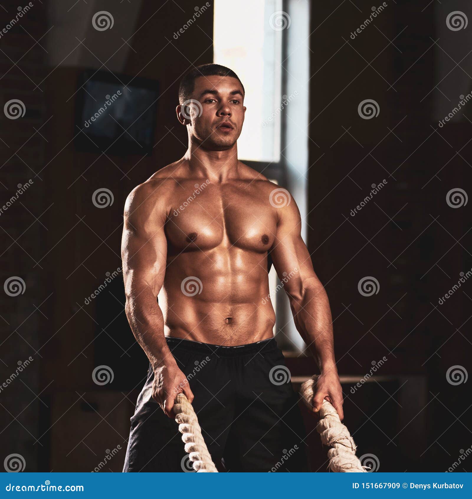 Bodybuilder with Battle Rope Stock Image - Image of modern, biceps ...