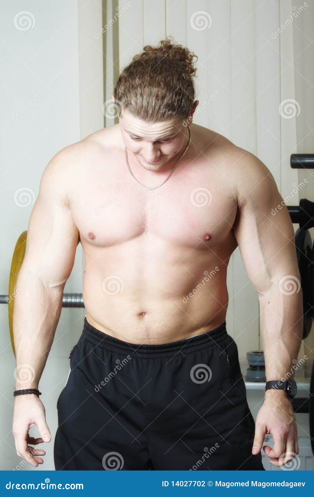 Bodybuilder bending head stock photo. Image of caucasian - 14027702