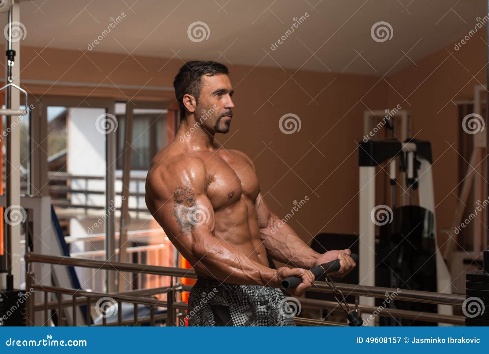 Bodybuilder Doing Exercise for Biceps Stock Image - Image of ...