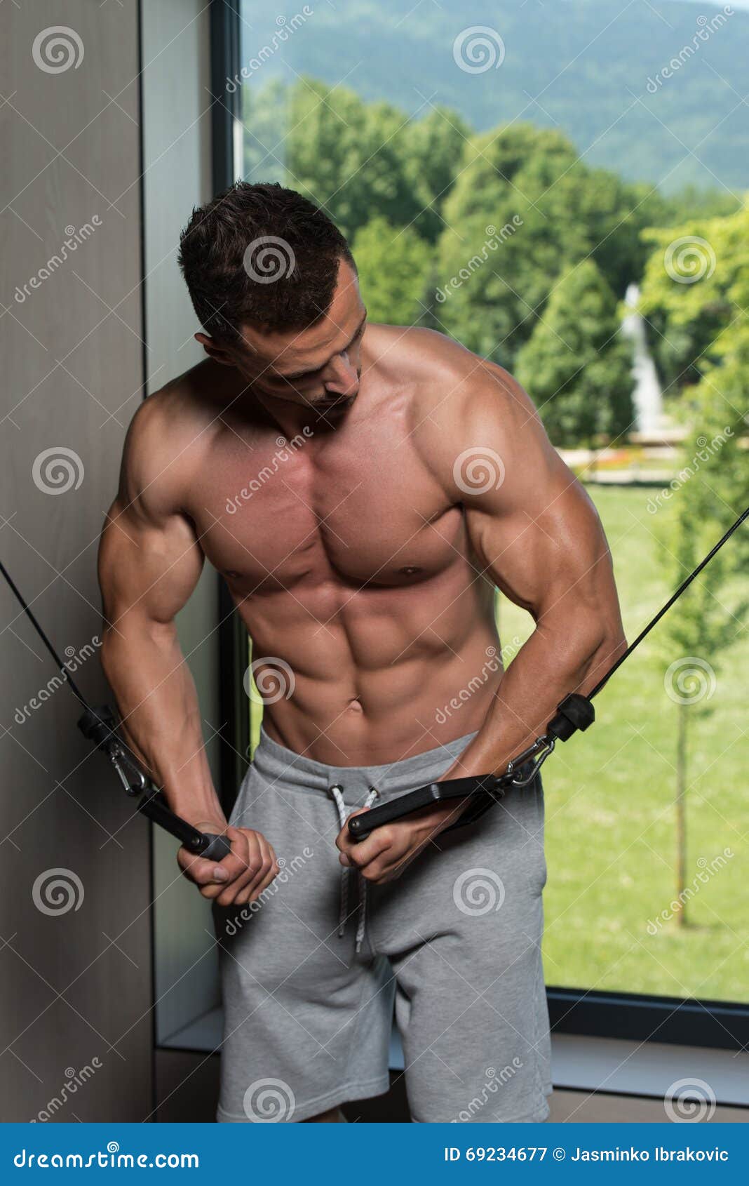 Bodybuilder Doing Exercise for Chest on Machine Stock Image - Image of ...