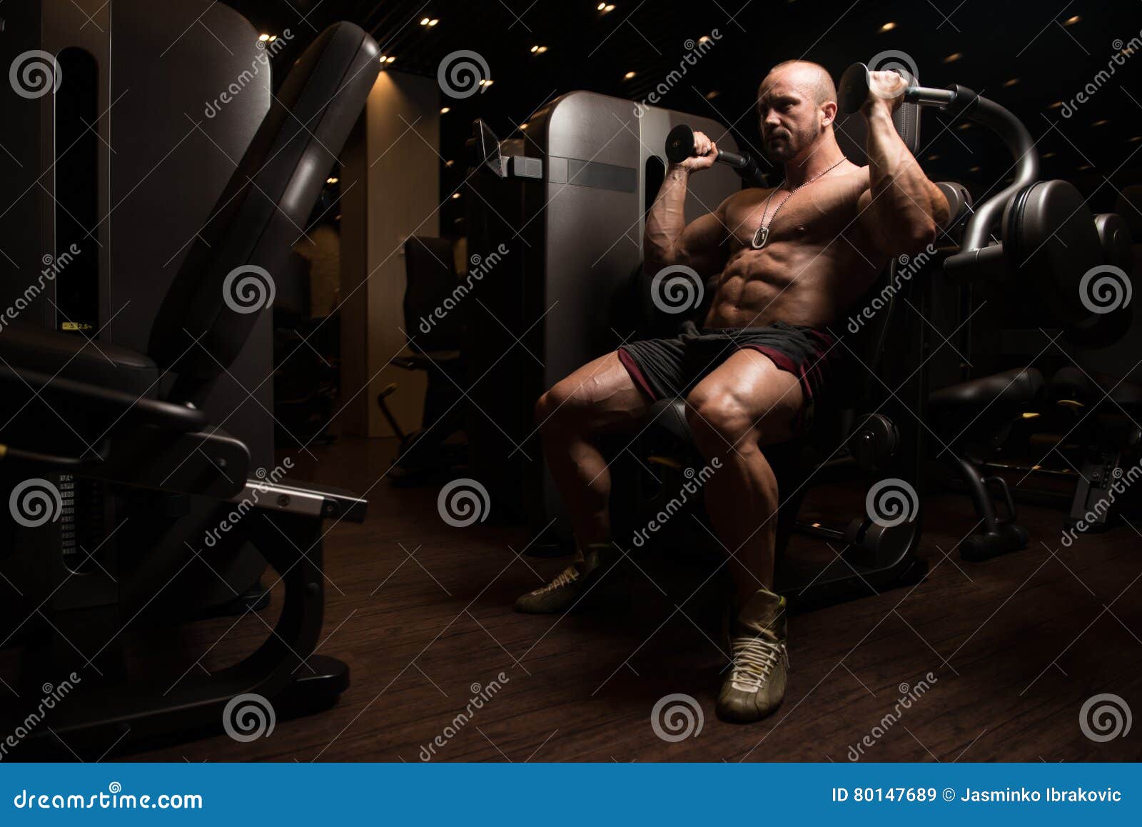 Bodybuilder Doing Exercise for Triceps on Machine Stock Image - Image ...