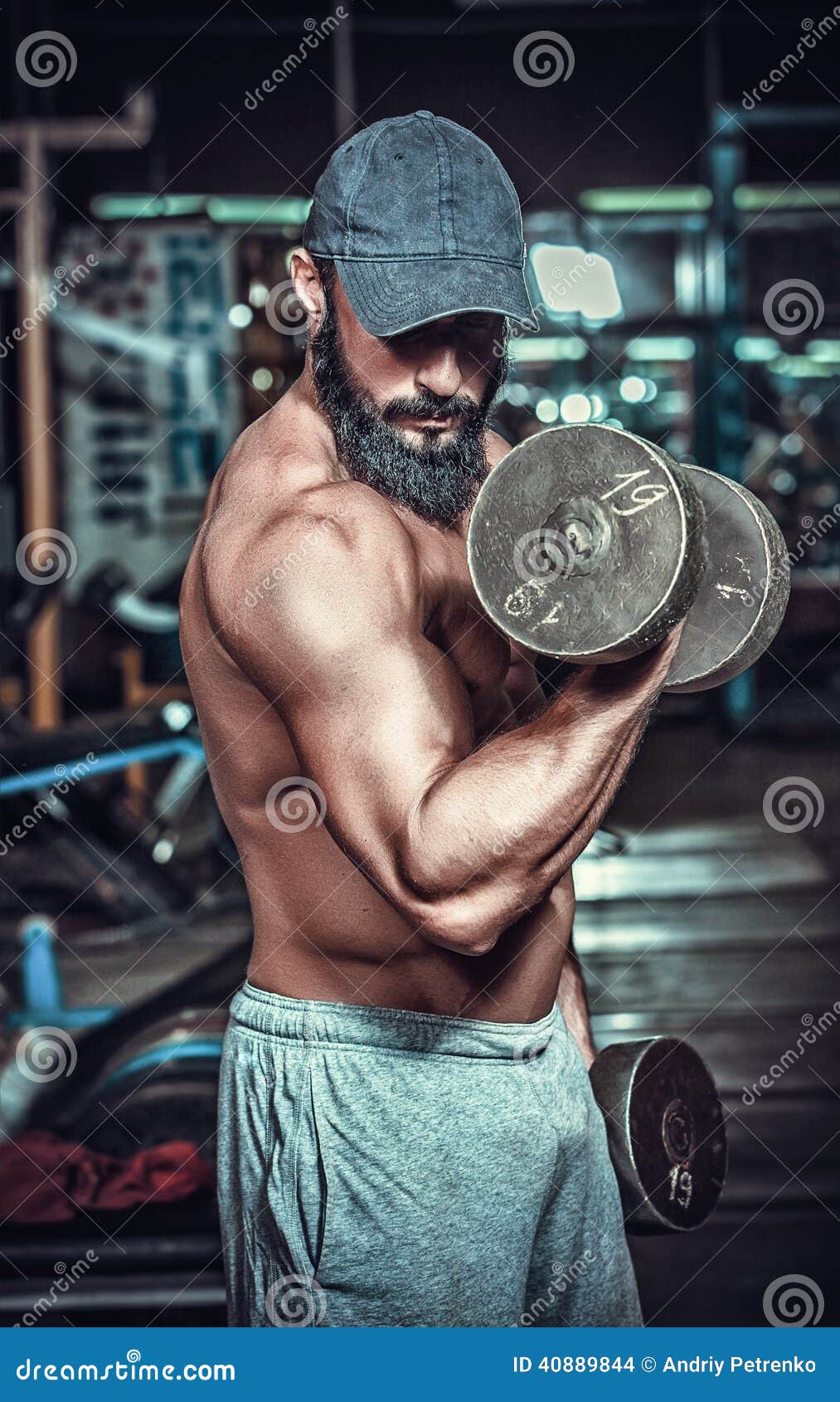 Bodybuilder Doing Exercises With Dumbbells Stock Photo | CartoonDealer ...