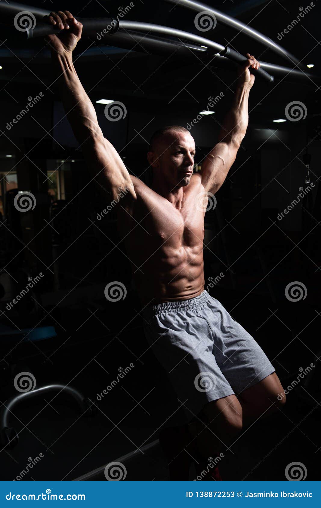 Bodybuilder Doing Pull Ups Best Back Exercises Stock Image - Image of ...
