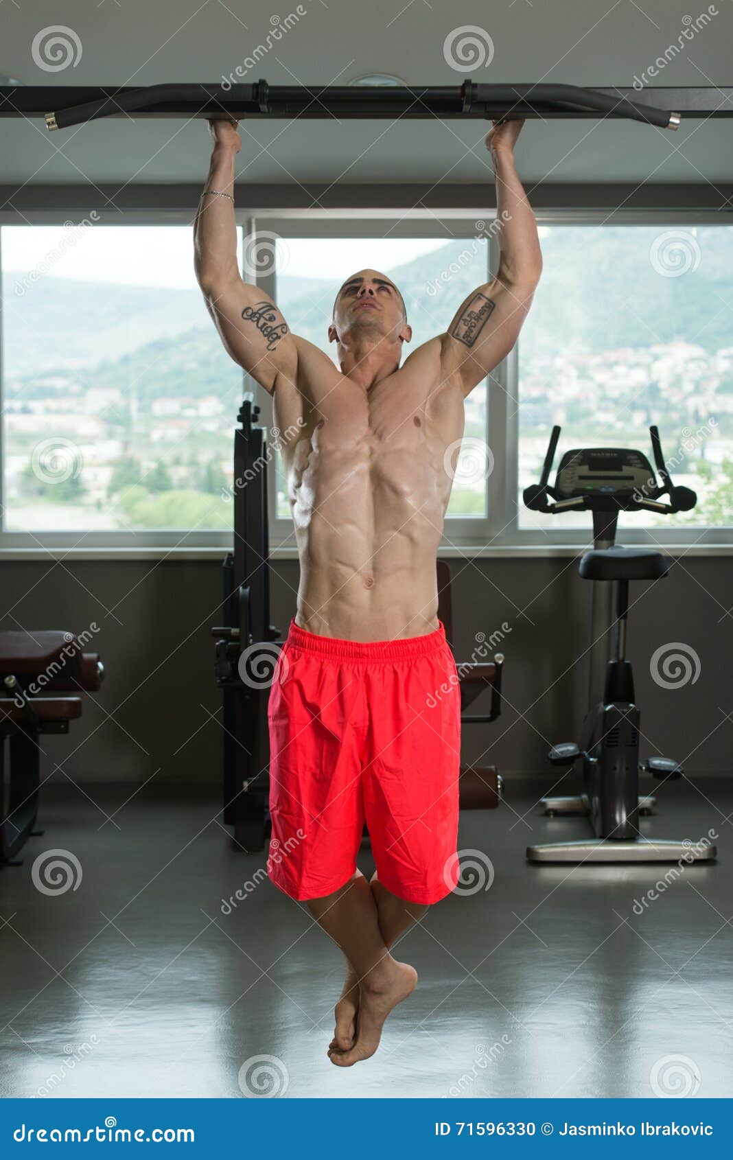 Bodybuilder Doing Pull Ups Best Back Exercises Stock Photo - Image of ...