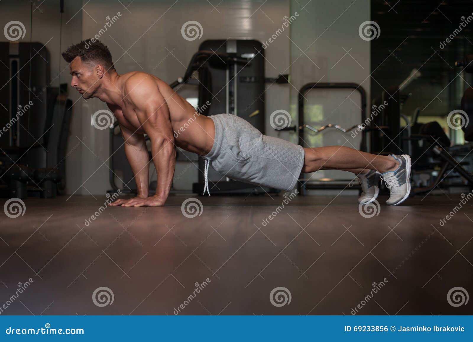 Bodybuilder Doing Push Ups on Floor Stock Photo - Image of person ...