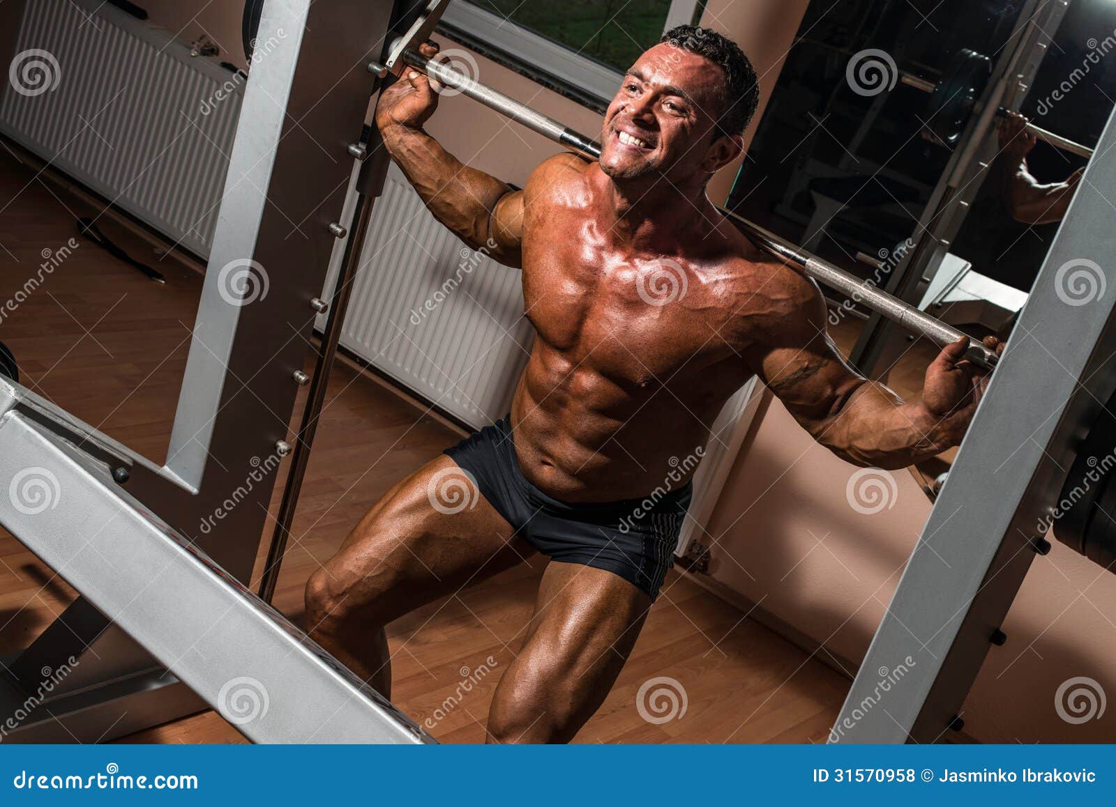 Bodybuilder Doing Squat with Barbell in Gym Stock Photo - Image of ...