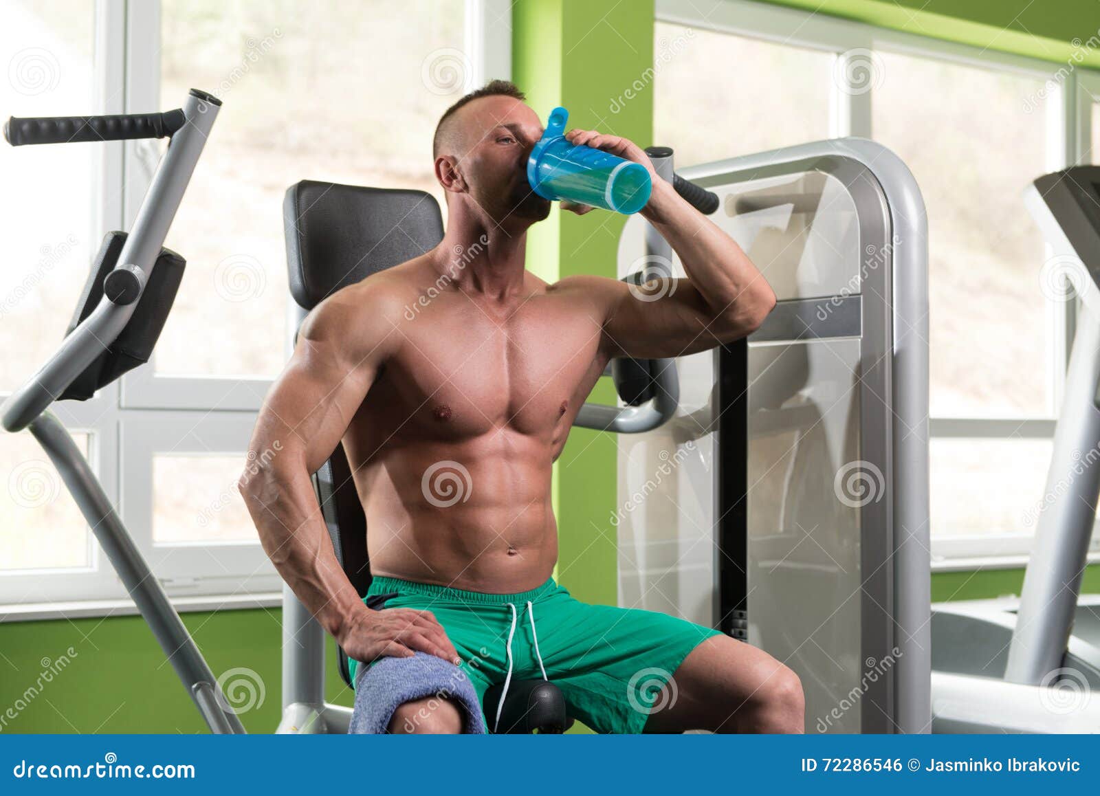Bodybuilder Drinking Water from Shaker Stock Photo - Image of athlete ...