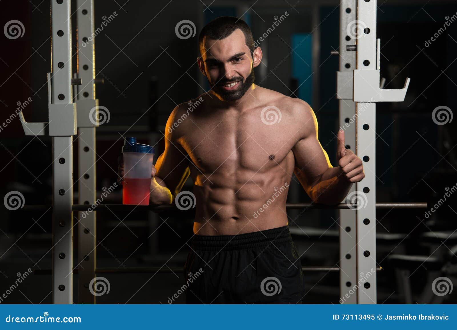 Bodybuilder Drinking Water from Shaker Stock Image - Image of black ...
