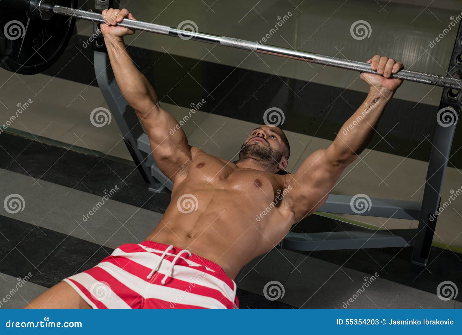 Bodybuilder Exercising Chest with Barbell Stock Image - Image of ...