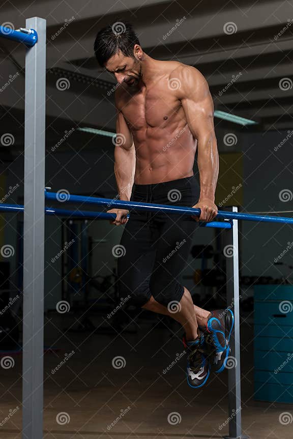Bodybuilder Exercising on Parallel Bars Stock Image - Image of human ...