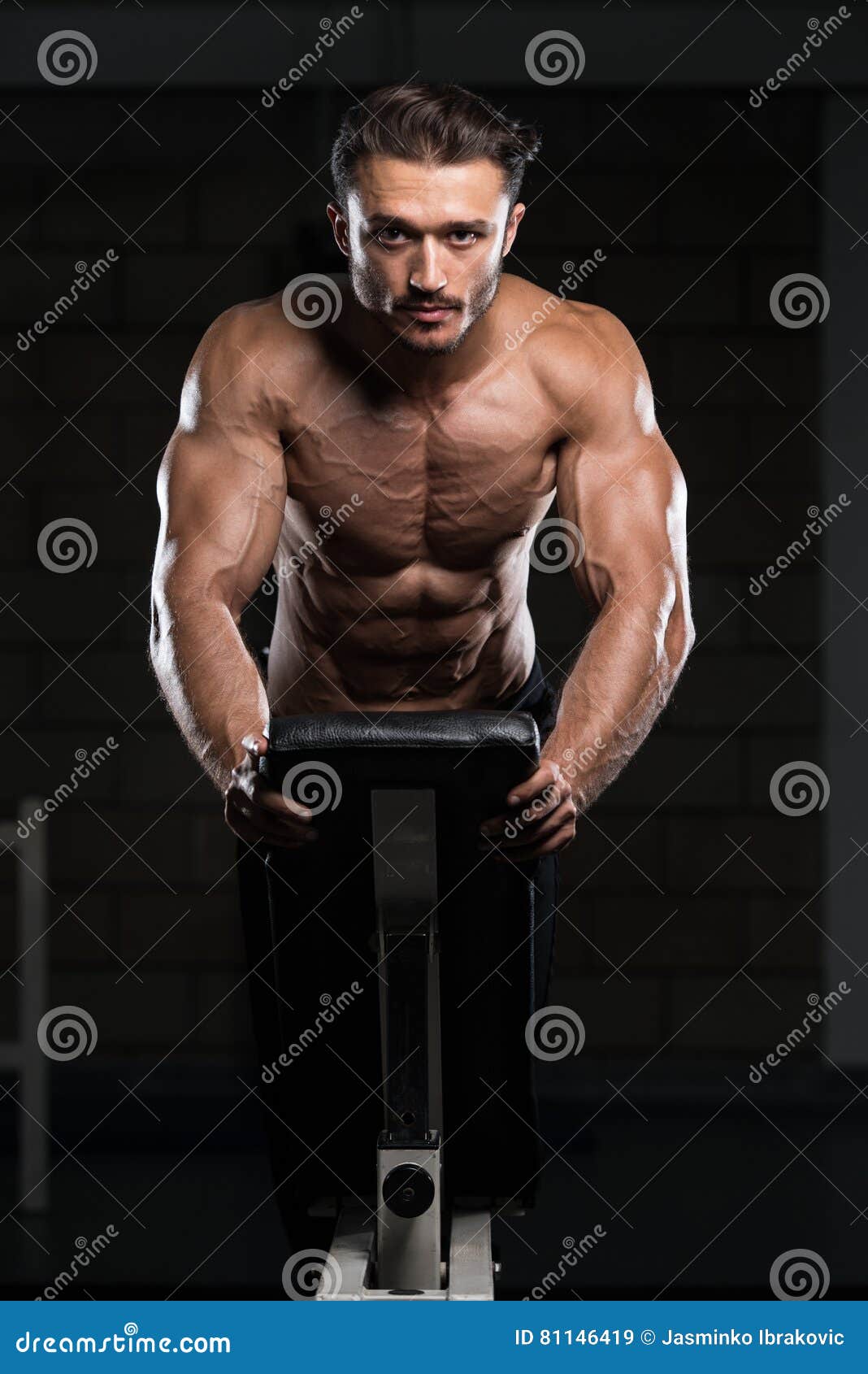 Bodybuilder Exercising Push Ups on Bench Stock Image - Image of ...