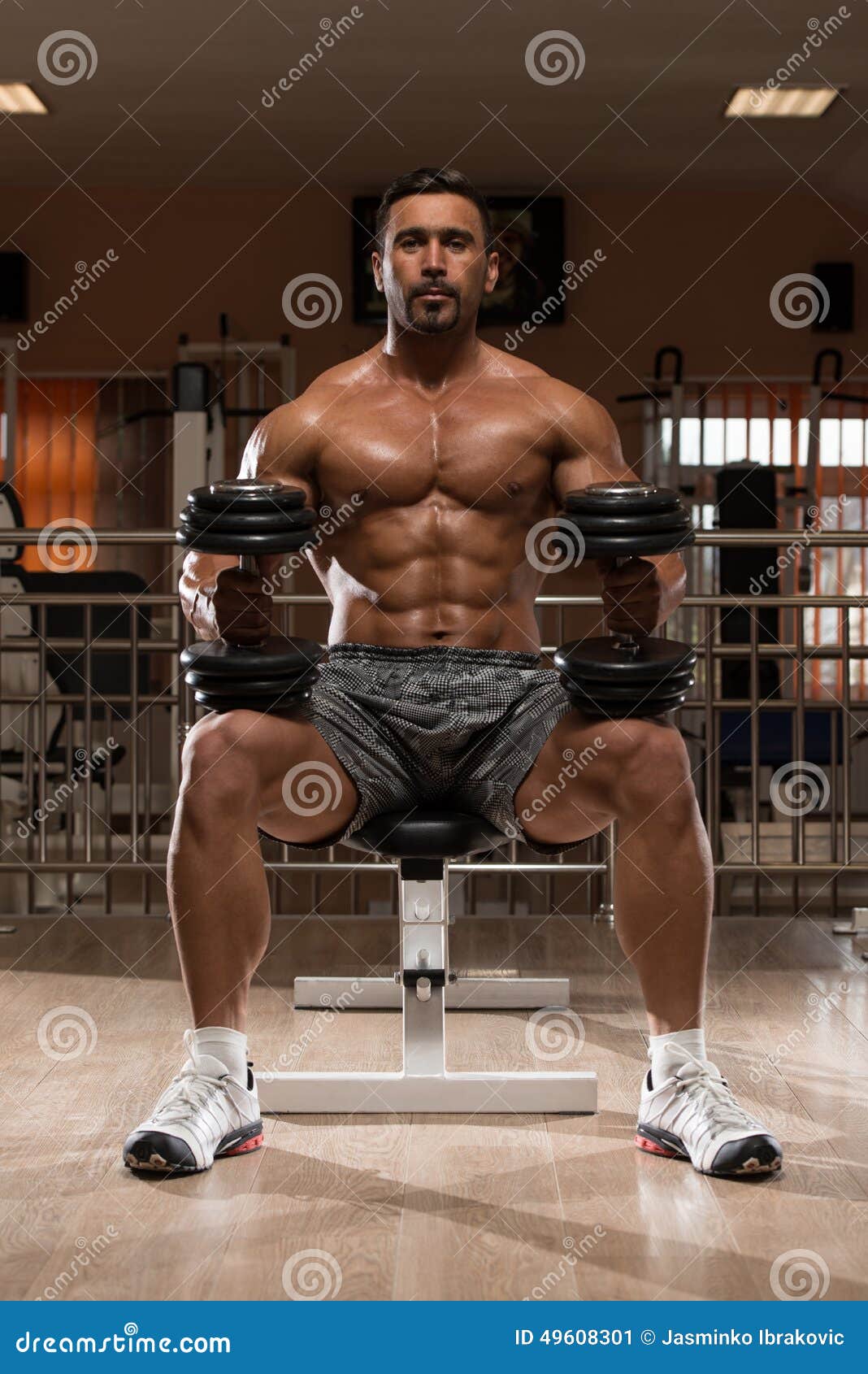 Bodybuilder Exercising Shoulders Stock Image - Image of flexing, black ...