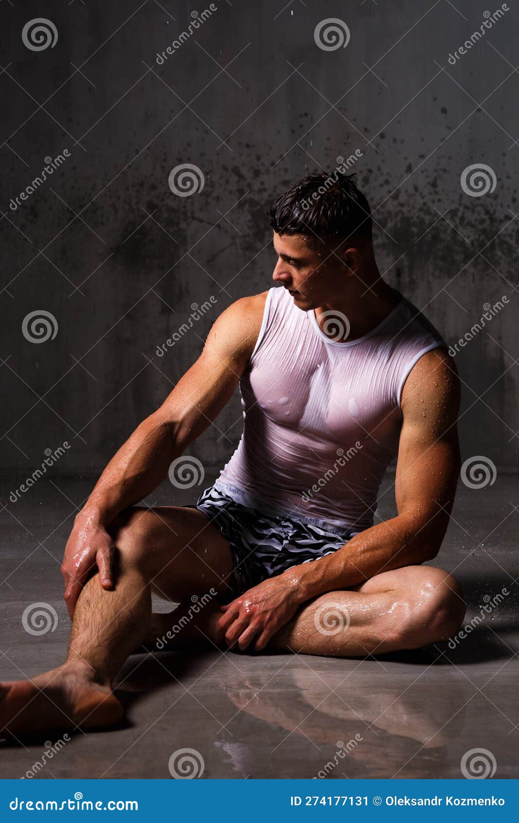 Athlete Bodybuilder Trains in the Studio in the Rain. Stock Image ...