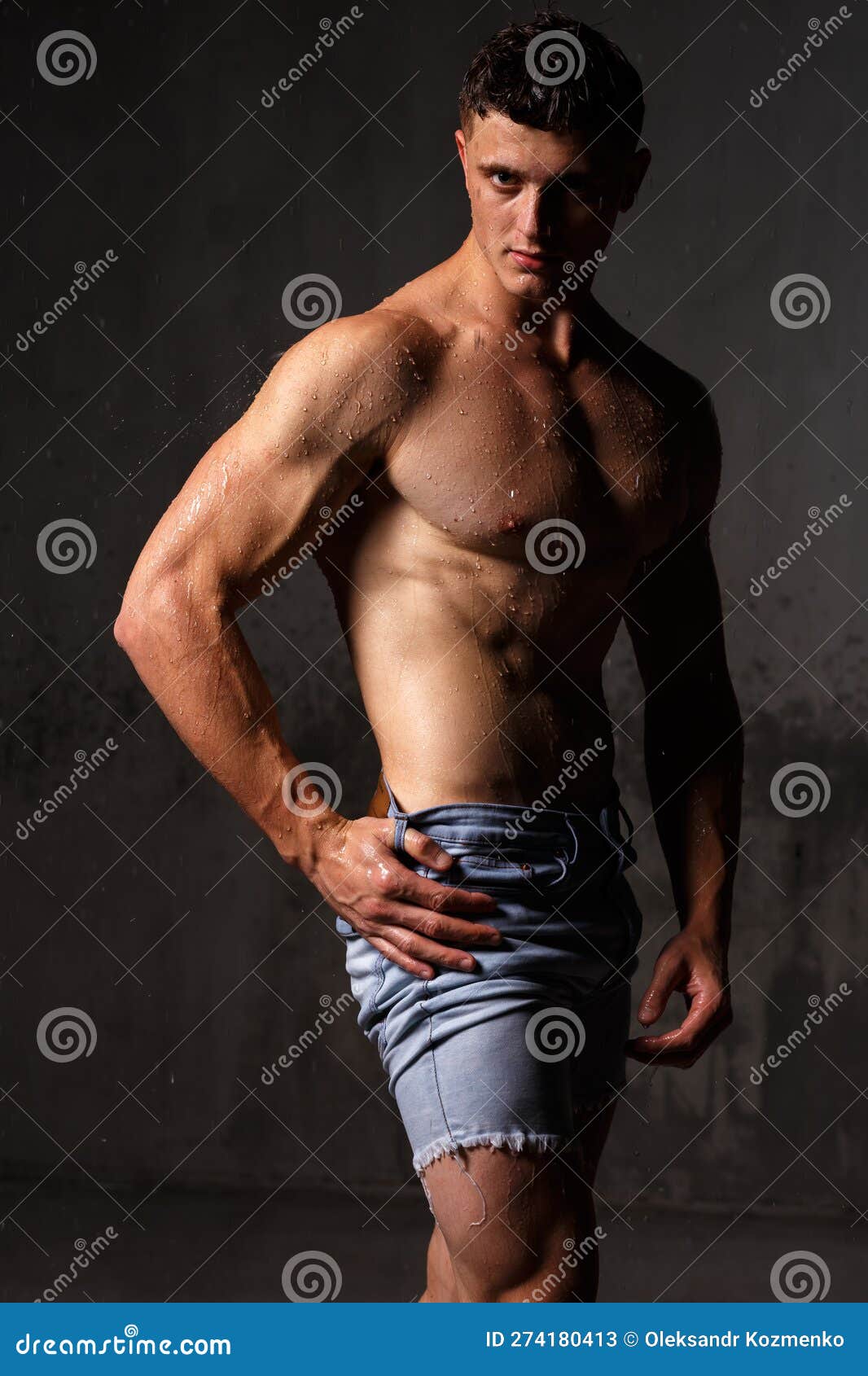 Athlete Bodybuilder Trains in the Studio in the Rain. Stock Image ...