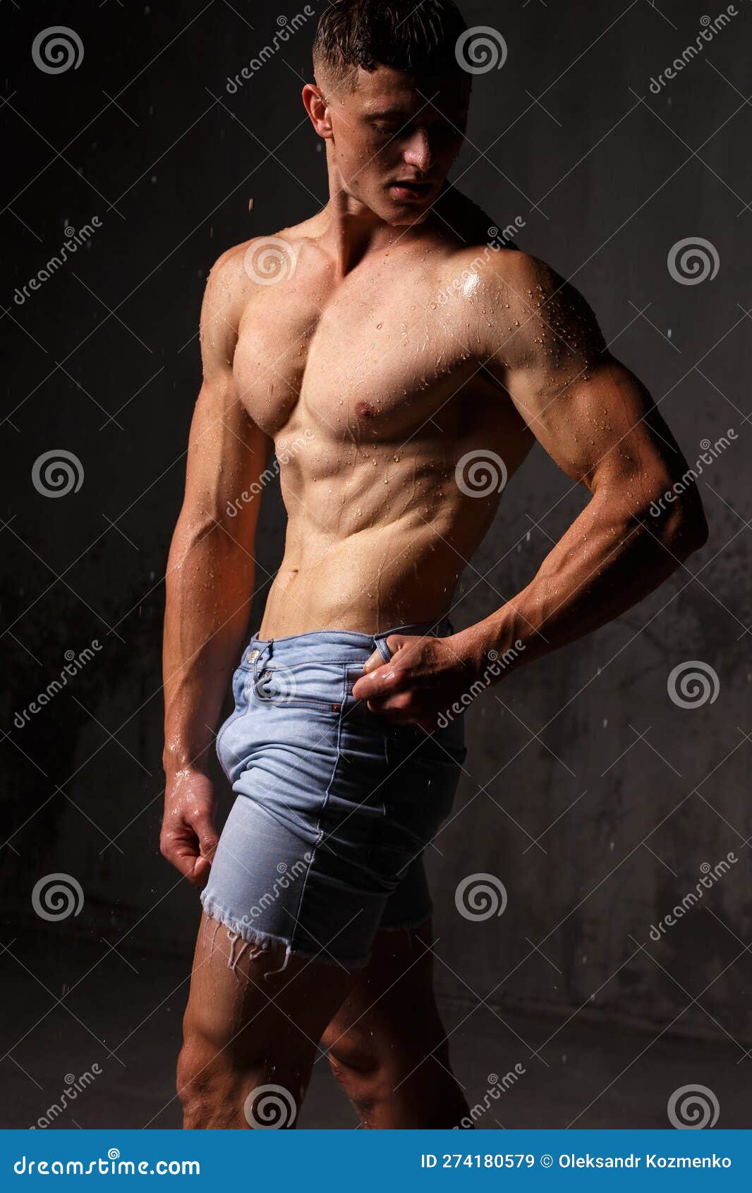 Athlete Bodybuilder Trains in the Studio in the Rain. Stock Image ...