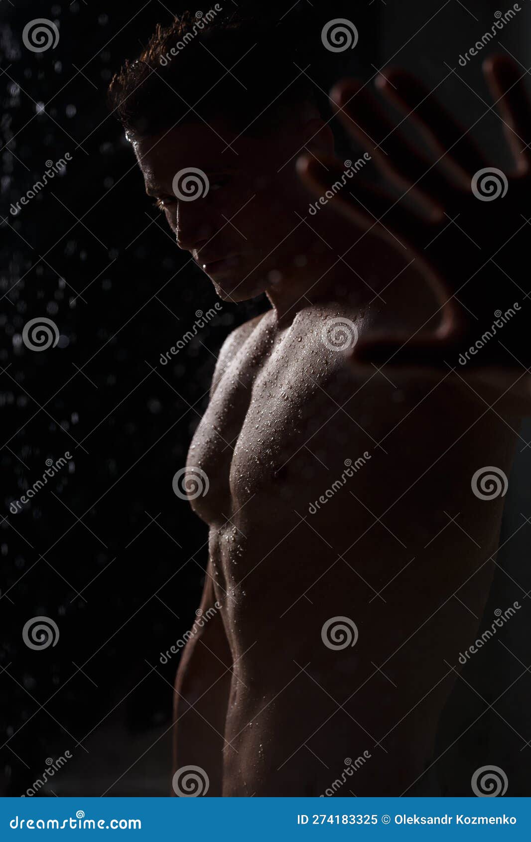 Athlete Bodybuilder Trains in the Studio in the Rain. Stock Image ...
