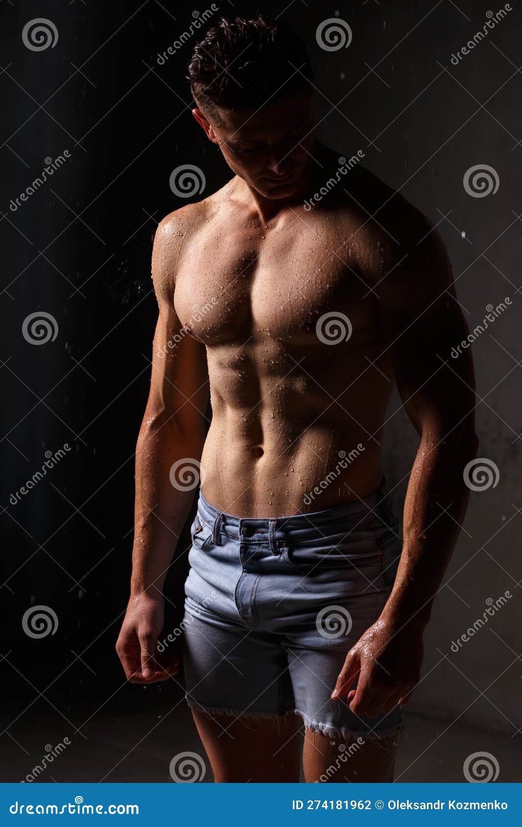 Athlete Bodybuilder Trains in the Studio in the Rain. Stock Photo ...