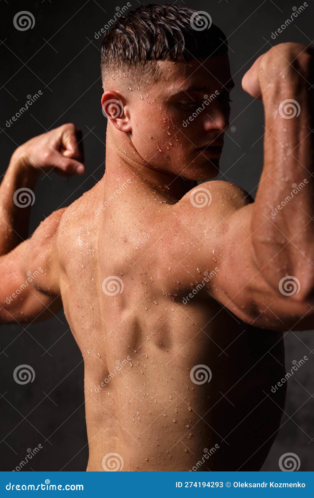 Athlete Bodybuilder Trains in the Studio in the Rain. Stock Image ...