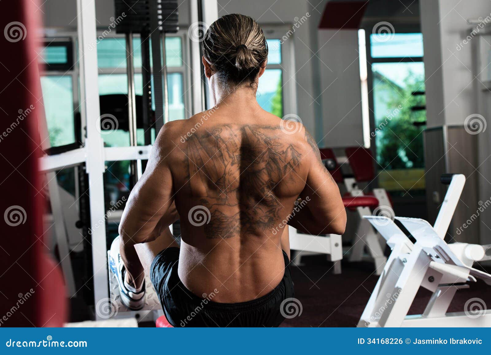 Bodybuilder Flexing His Back Stock Photo - Image of flex, italian: 34168226