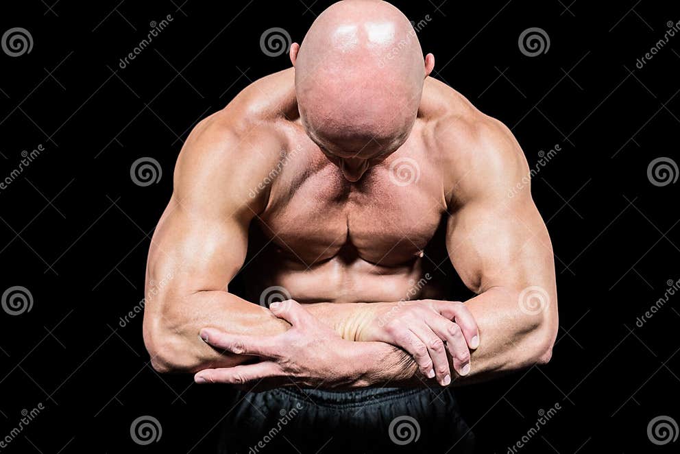 Bodybuilder Flexing Muscles while Looking Down Stock Image - Image of ...
