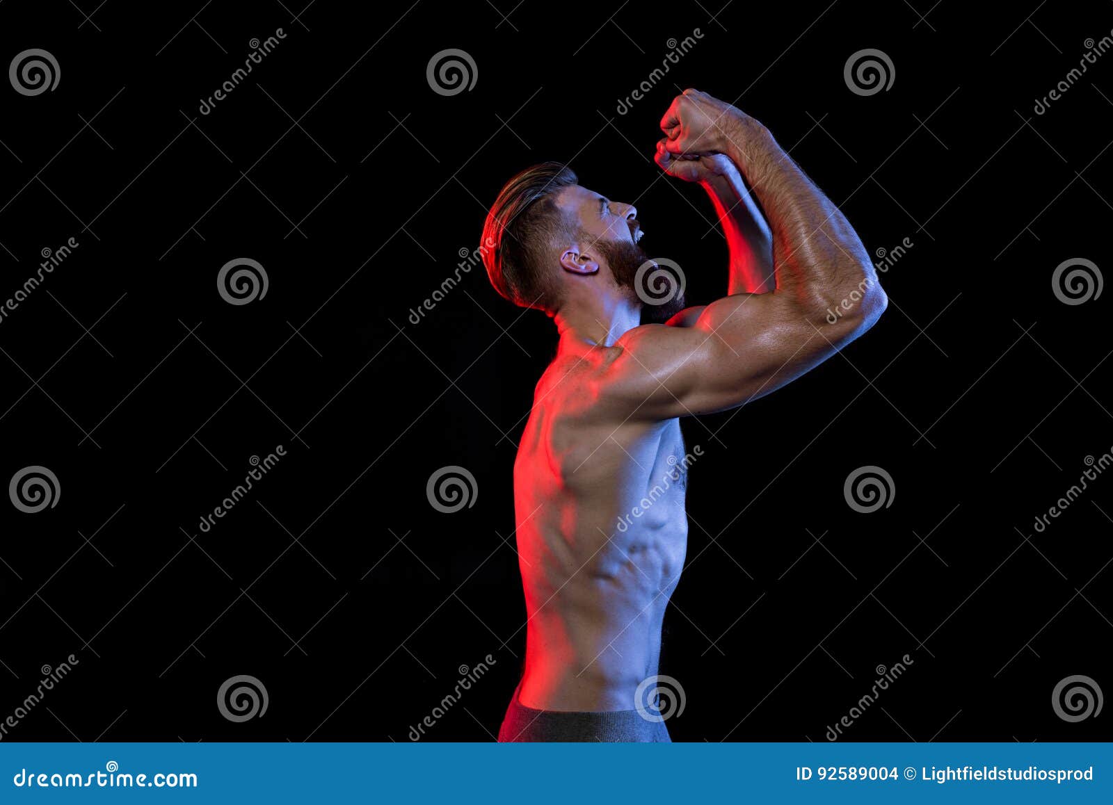 Bodybuilder Gesturing and Yelling Isolated on Black with Dramatic ...